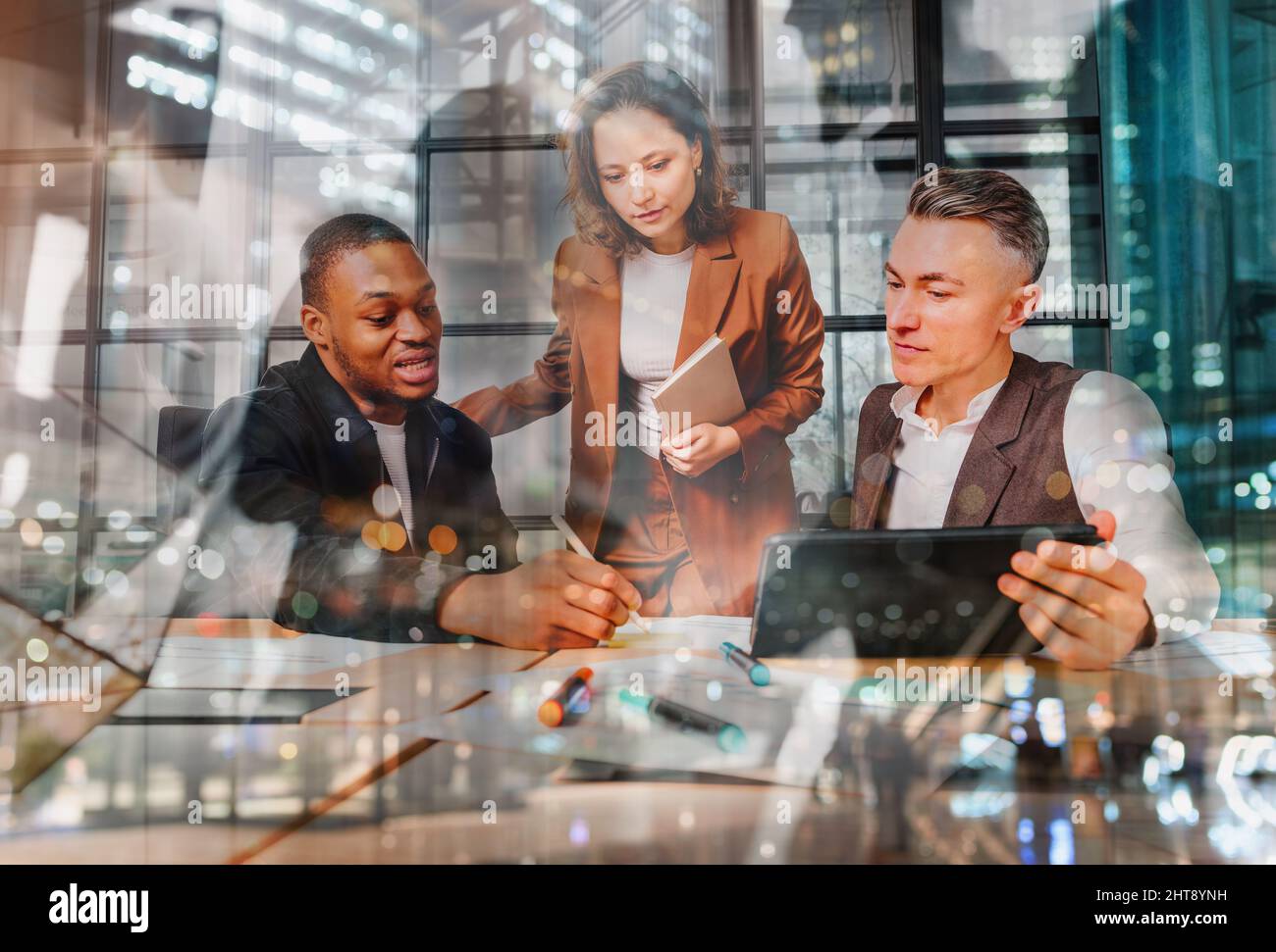 Group of business people have a meeting about company stats Stock Photo ...