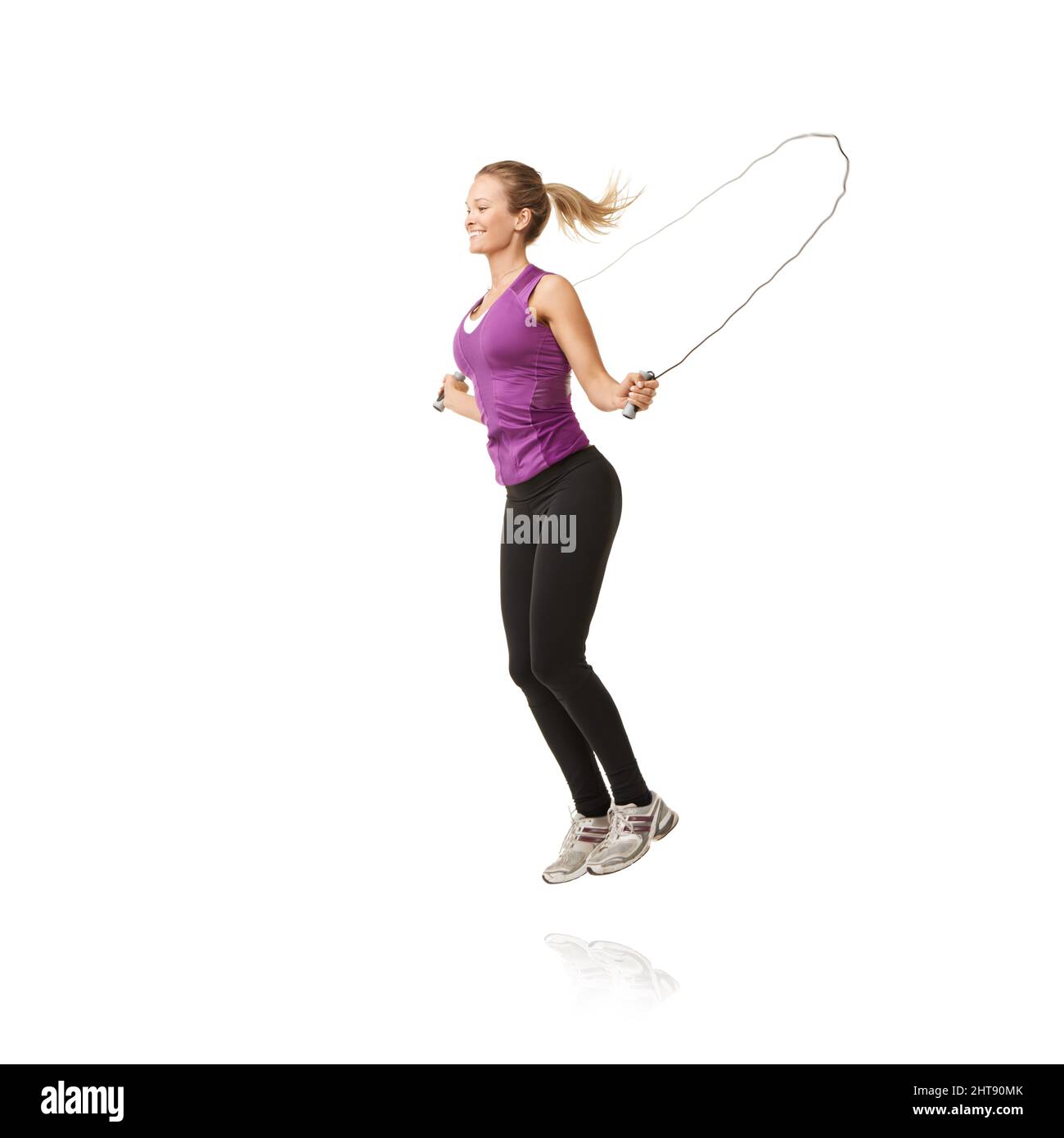 Female jumping on skipping rope hi-res stock photography and images - Alamy