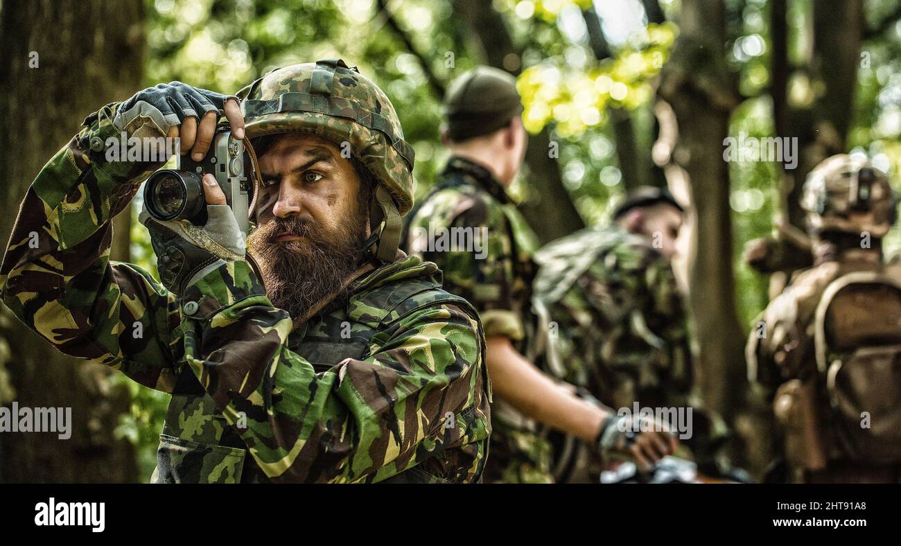 Battle of the military in the war. Military soldier photojournalist ...