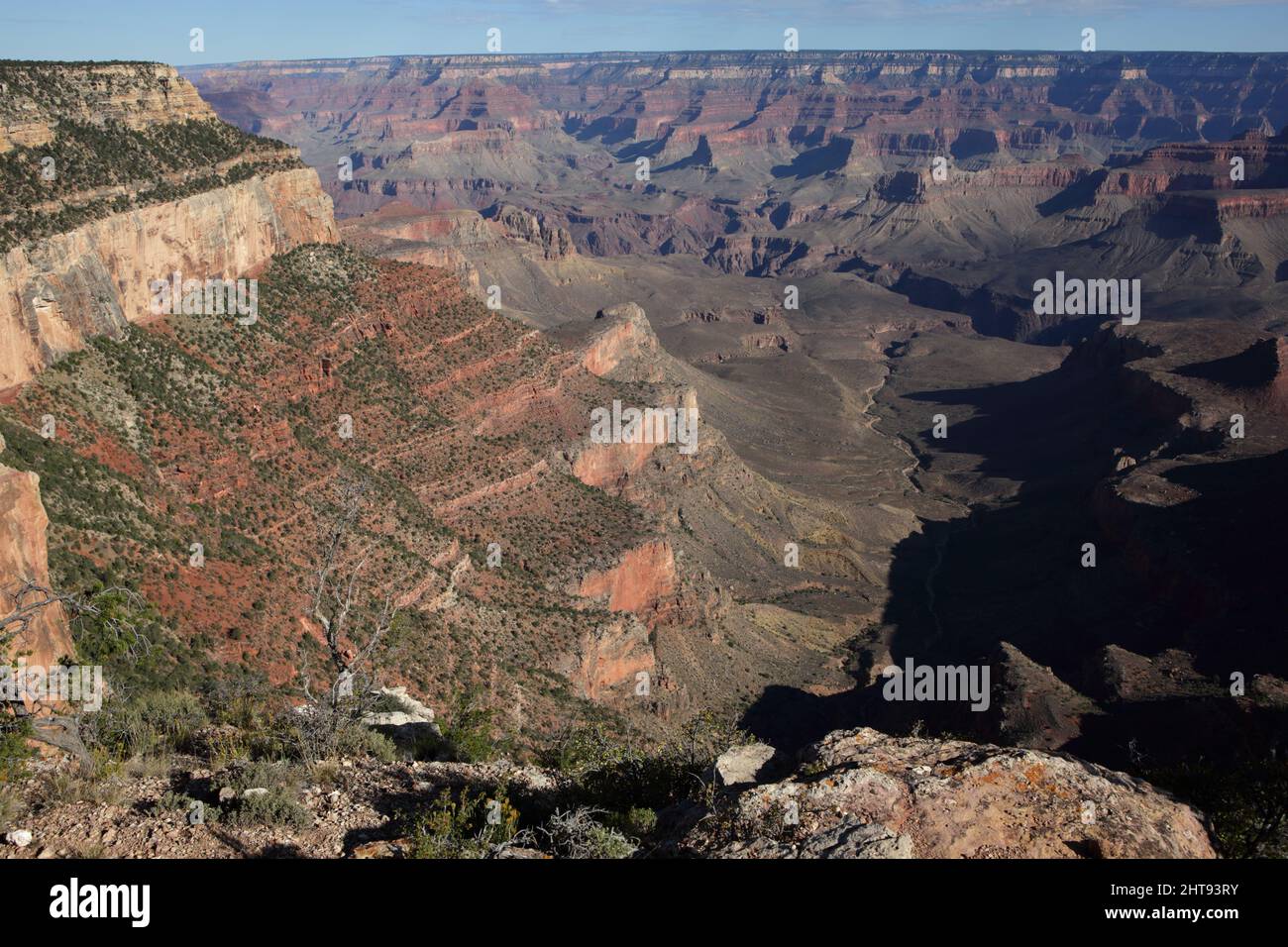 View of cliffs, buttes, and rock layers, down in the depths of the ...