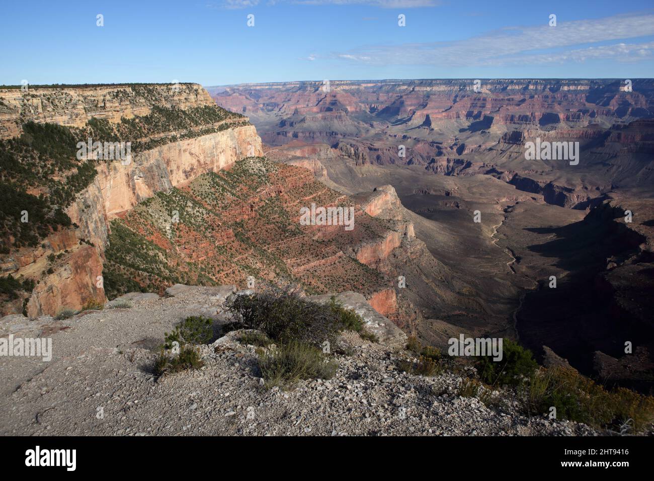 View of cliffs, buttes, and rock layers, down in the depths of the ...