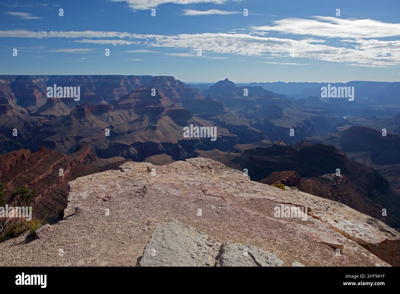 View of cliffs, buttes, and rock layers, down in the depths of the ...