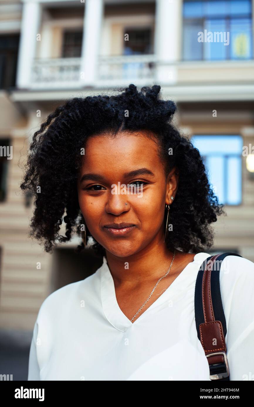 Young Pretty African Girl Posing Cheerful On City Background Lifestyle