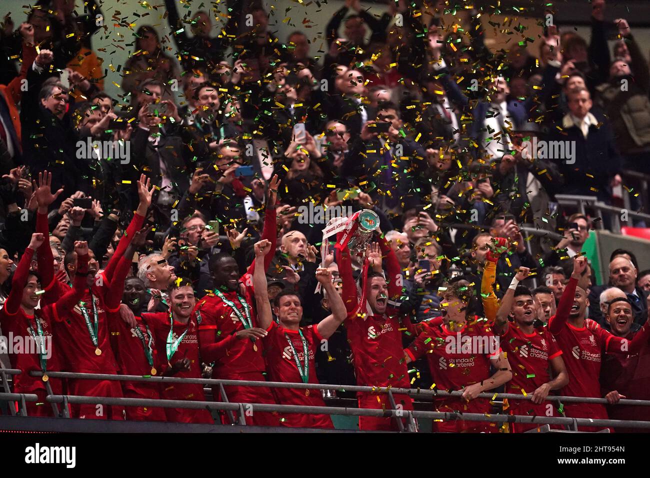 Liverpool players celebrate after winning the Carabao Cup final at ...