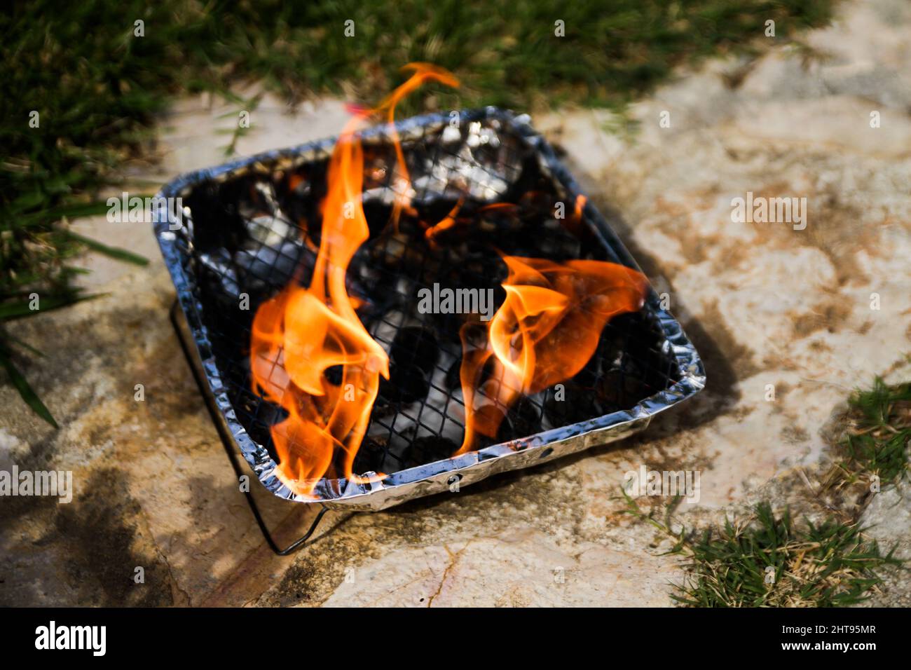 Closeup of a lit bonfire Stock Photo - Alamy