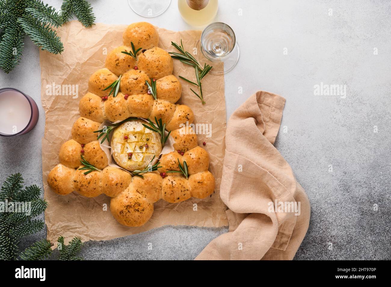 Bread buns Christmas tree with Roasted camembert cheese and rosemary on ...