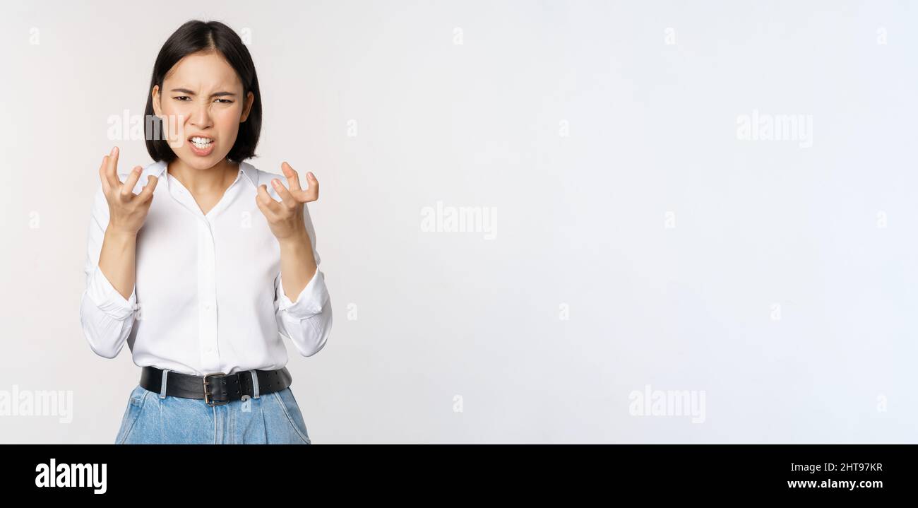 Image of angry pissed off woman shaking from anger, clench hands and ...