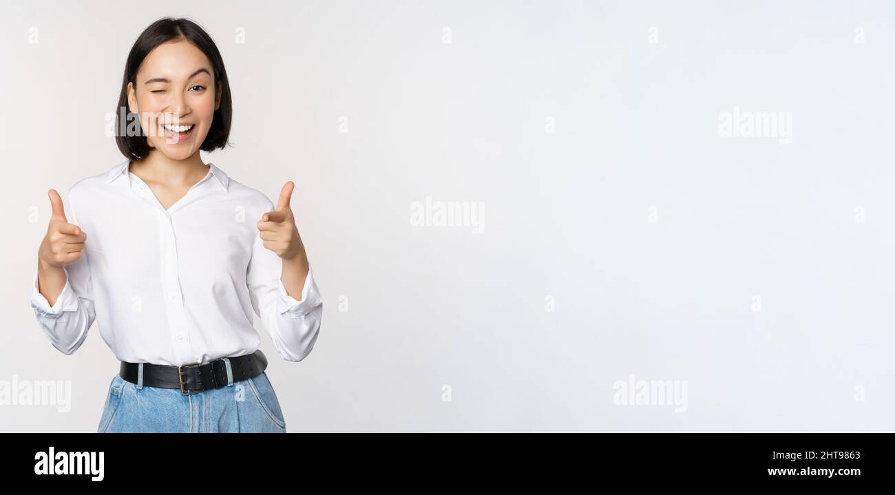 Its you congrats. Smiling attractive asian woman, businesswoman ...