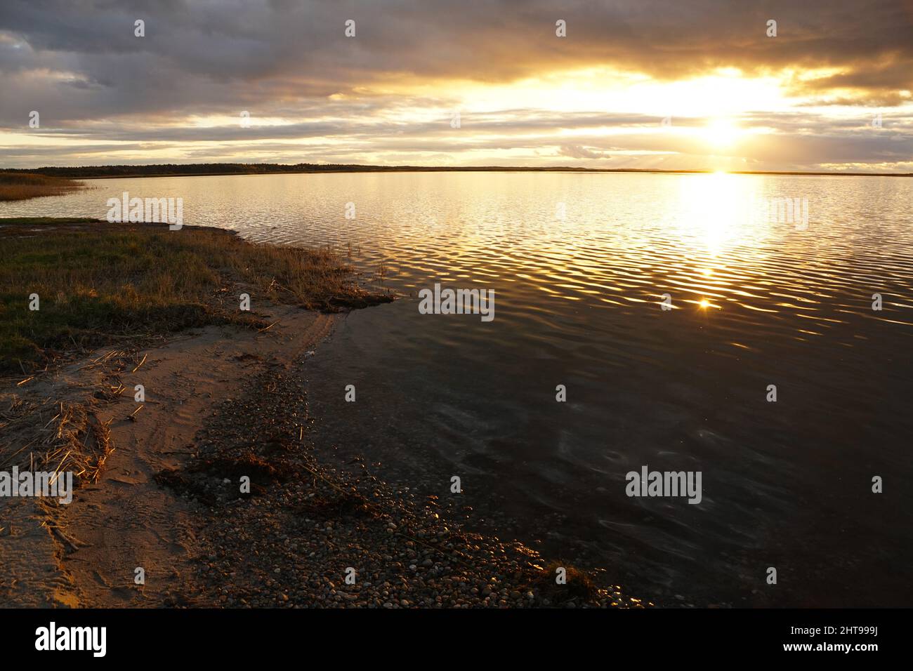 Scenic view of the seaside in Poland with cloudy sky in the background ...