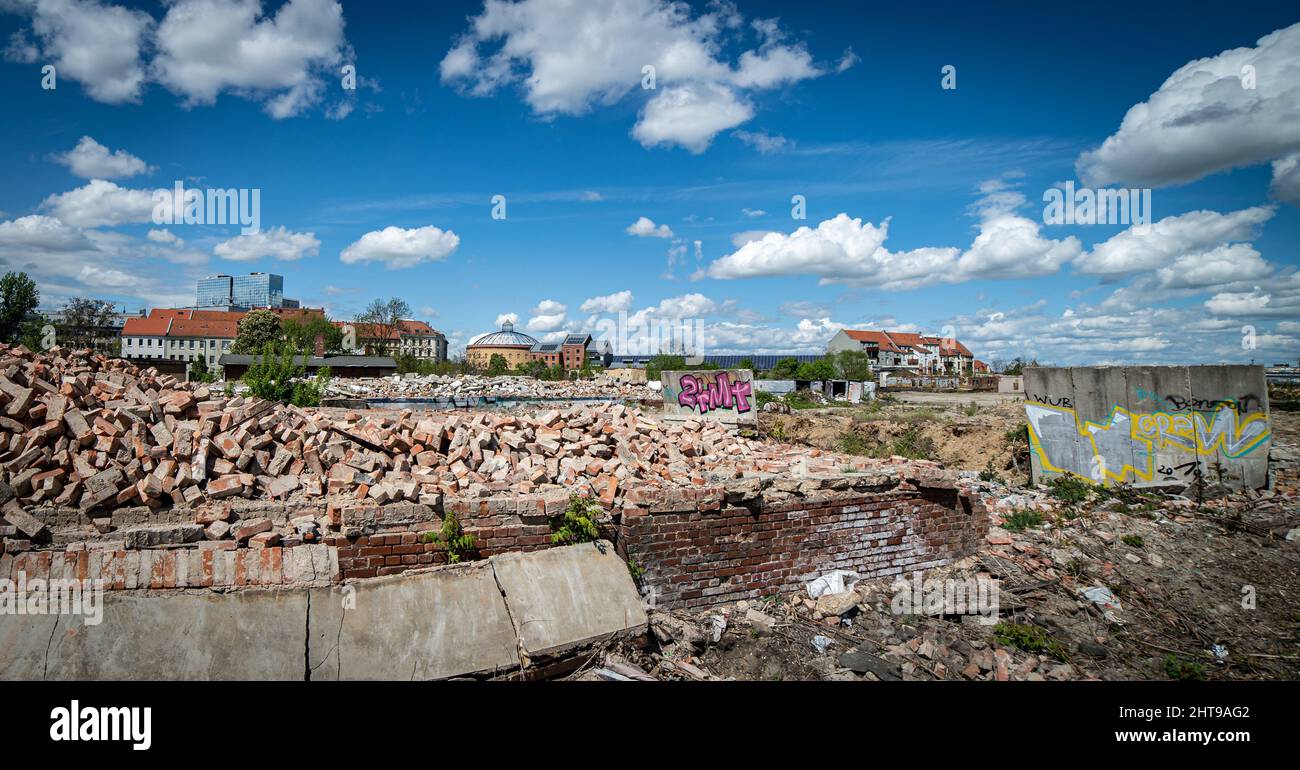 Ruins of a demolished wall in junkyard in a bright sunlight in Leipzig ...