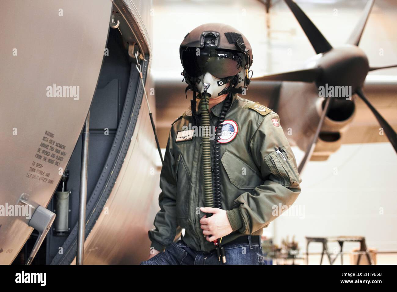 Ready for flight. A pilot standing in full gear next to his plane Stock ...