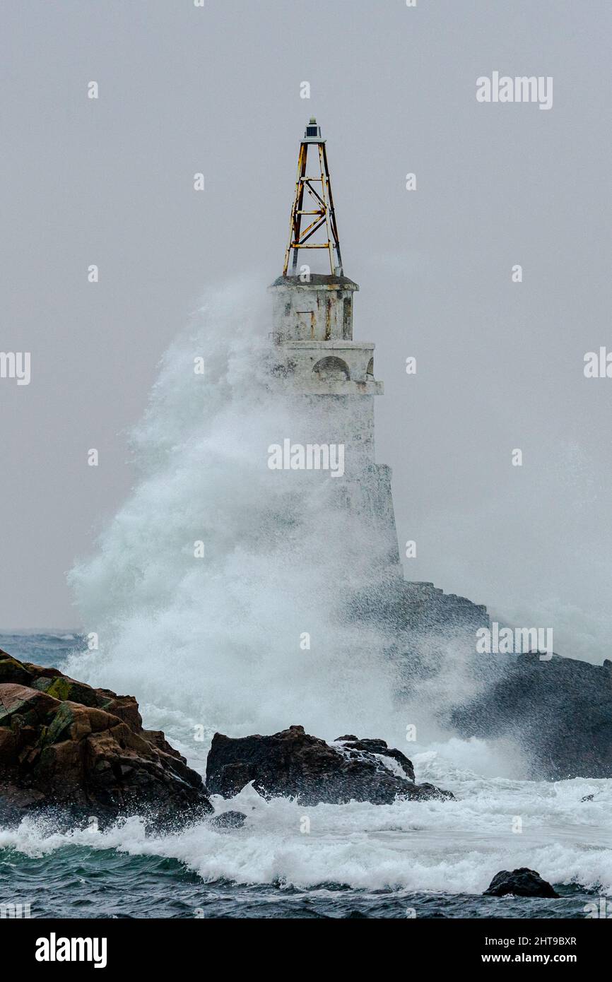 Closeup of a lighthouse in the ocean Stock Photo - Alamy