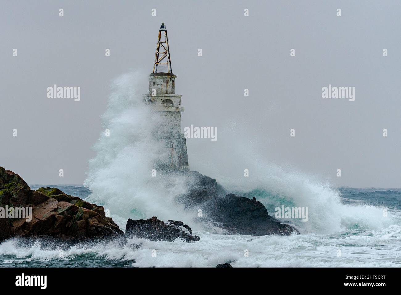 Beautiful shot of a metallic lighthouse in the middle of a streaming ...