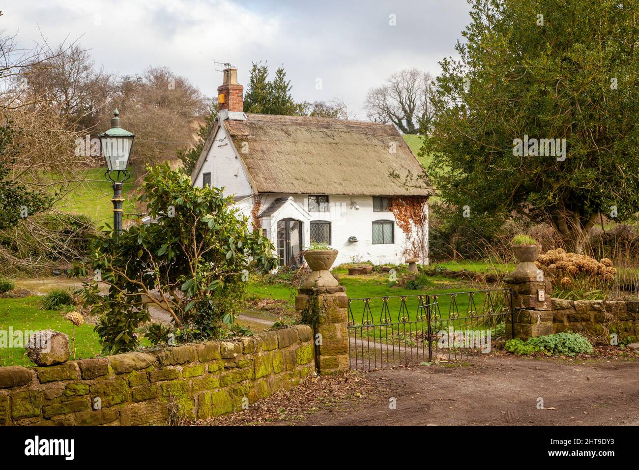 Thatched country cottage in the Cheshire rural village of Alvanley ...