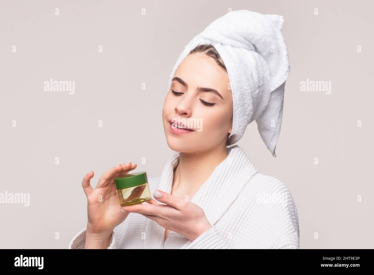 Facial treatment. Beautiful young woman with clean fresh skin. Girl ...