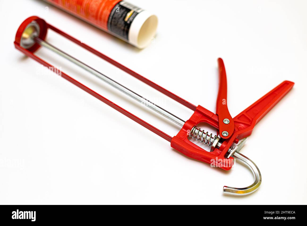 red caulk gun isolated on white background. High quality photo Stock ...