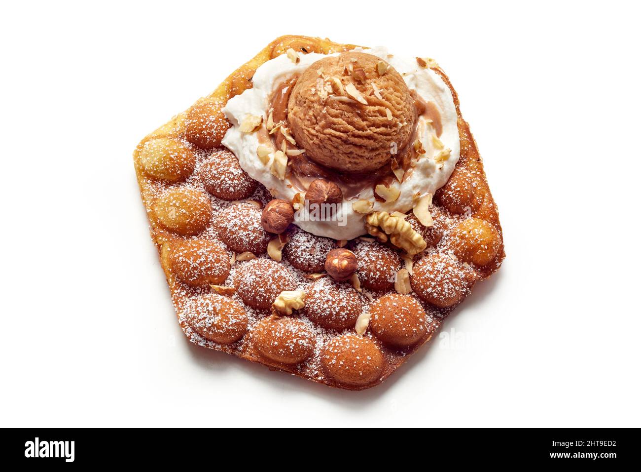 Delicious sweet bubble wafer with chocolate ice cream ball and nuts ...