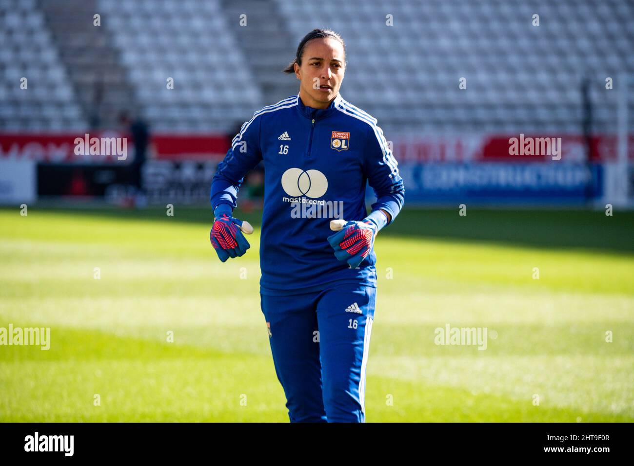 Sarah Bouhaddi of Olympique Lyonnais warms up ahead of the Women's ...