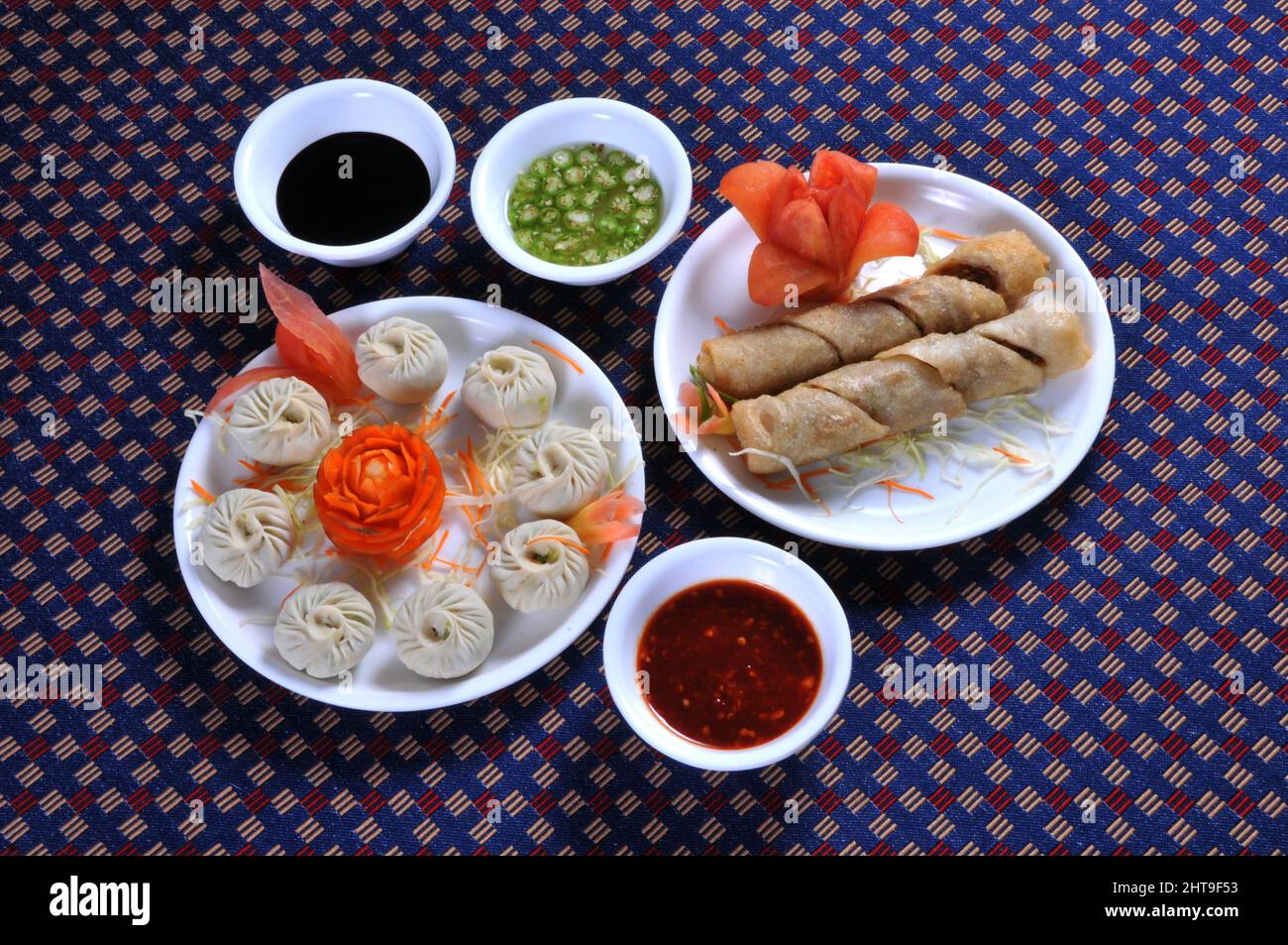 Chinese veg Momos and a Spring Roll Stock Photo - Alamy