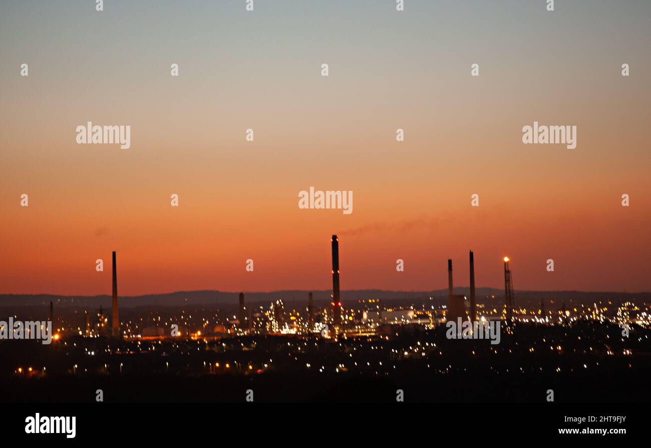 Night time evening dusk view of Stanlow oil refinery owned by Essar in ...