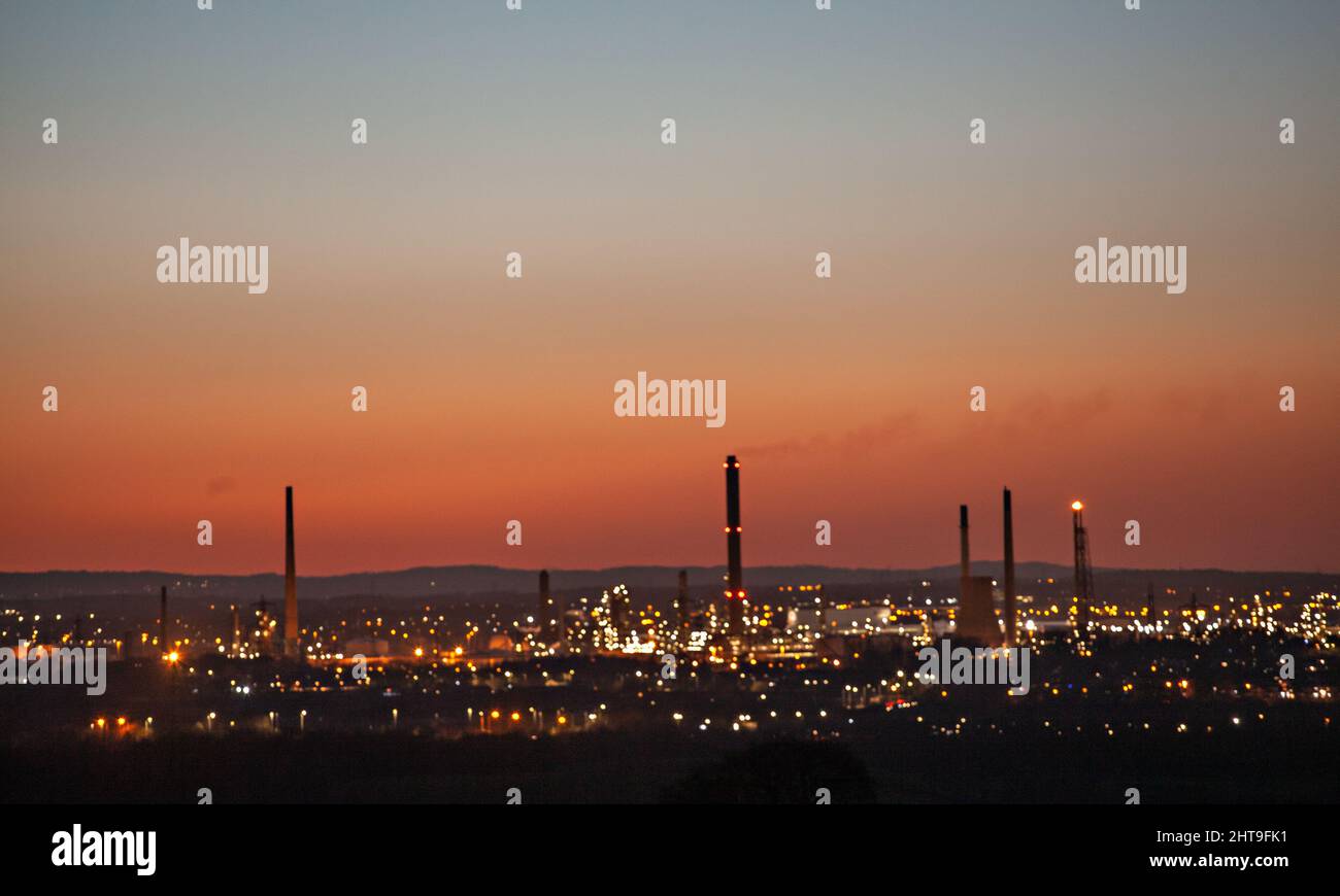 Night time evening dusk view of Stanlow oil refinery owned by Essar in ...