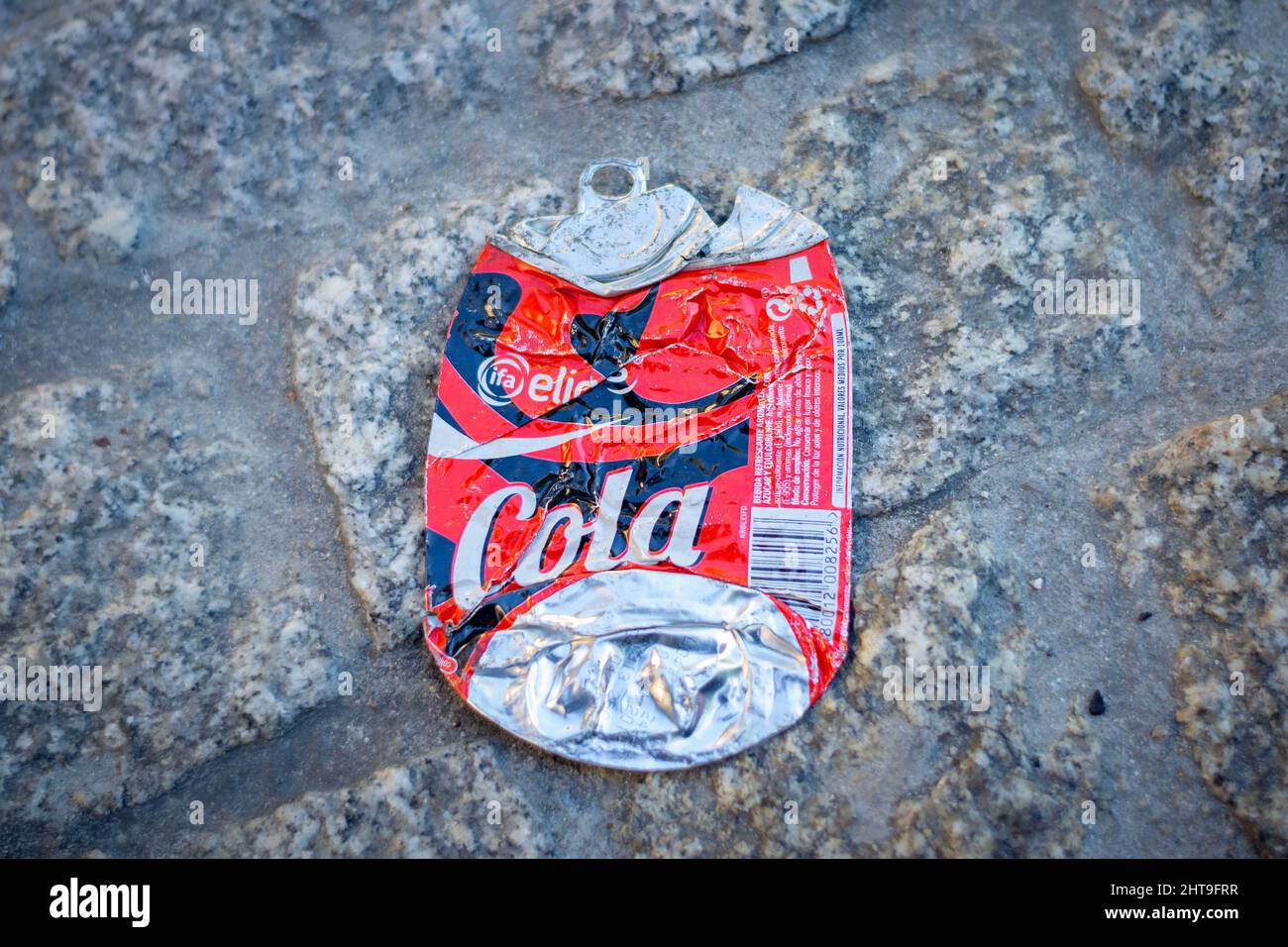 Closeup of a Crumpled special edition can of Coca Cola drink on the ...