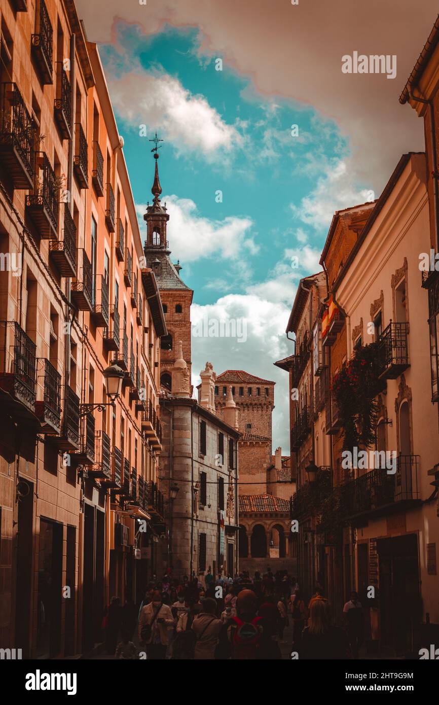 Beautiful scene of a crowded street and the Cathedral of Segovia in ...