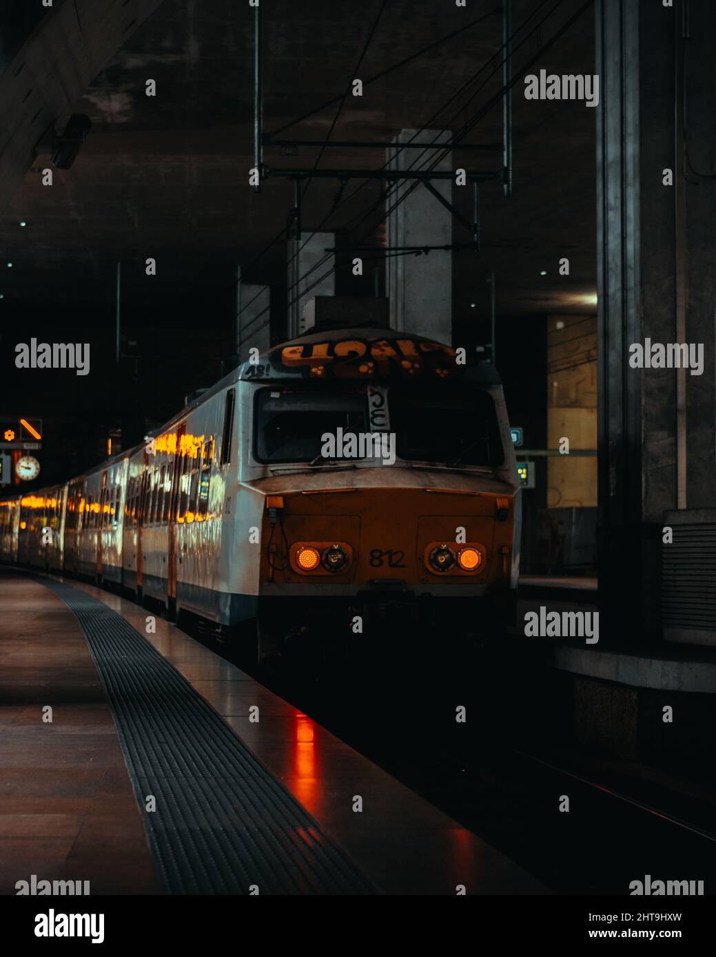 Vertical shot of the train arriving at the station Stock Photo - Alamy