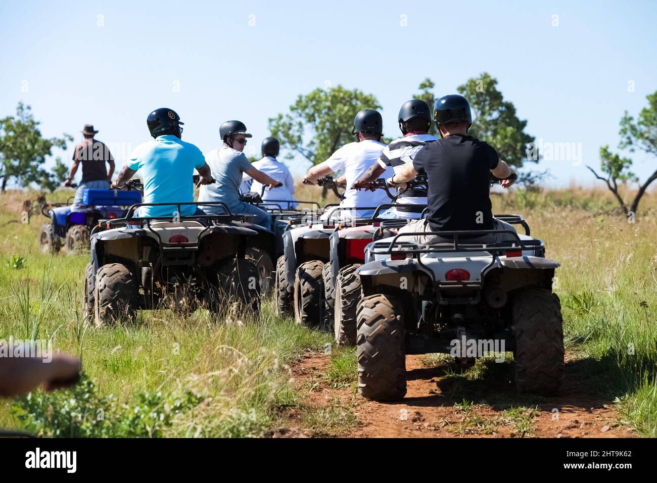 Beautiful shot of Quad bike adventure riding in African bush on dirt ...
