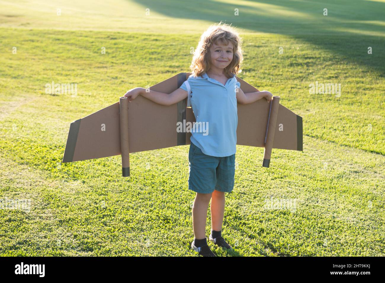 Child playing with toy jetpack. Child pilot astronaut or spaceman ...