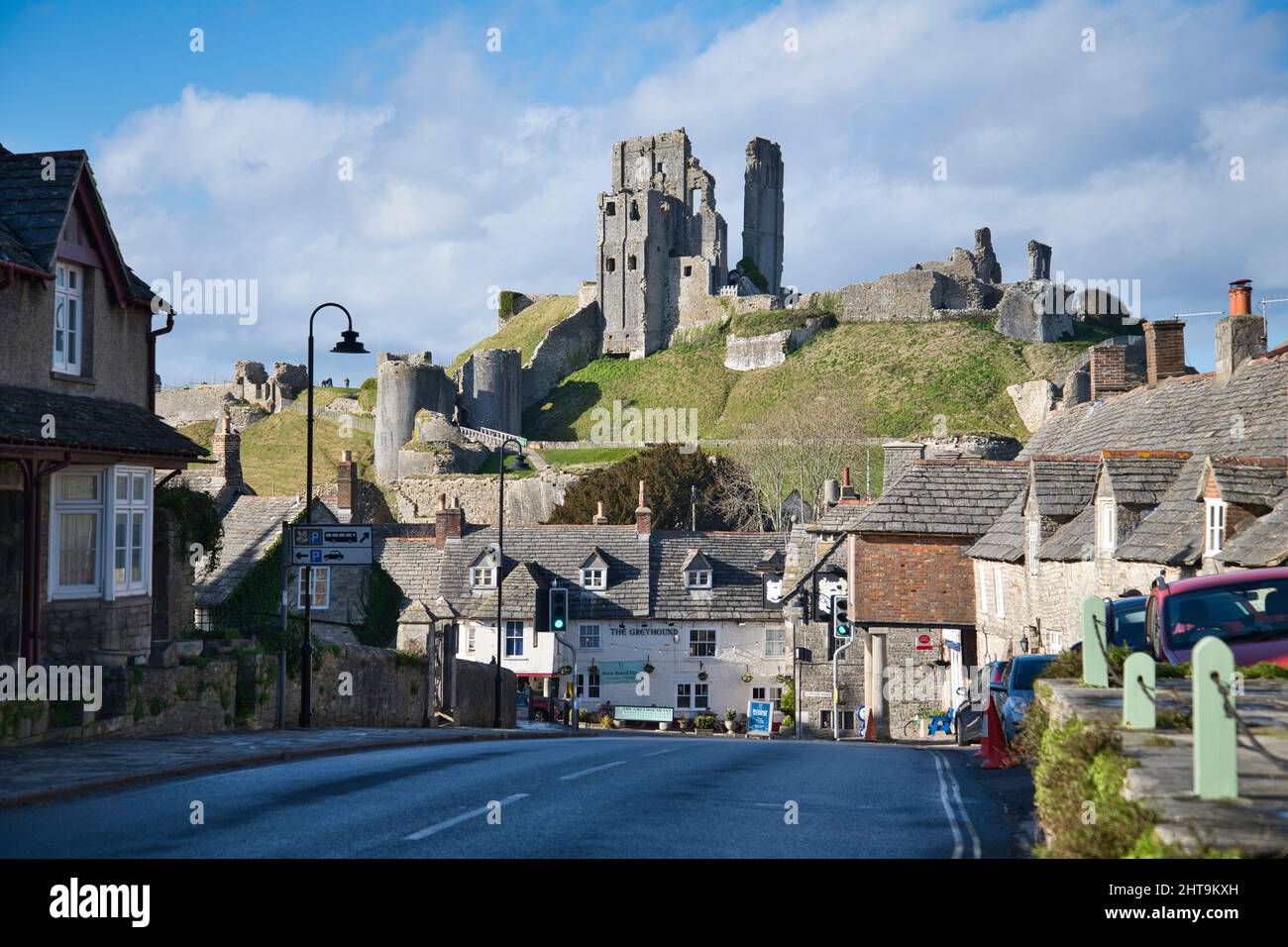 Corfe village, viewed from East Street and showing the ruins of Corfe ...