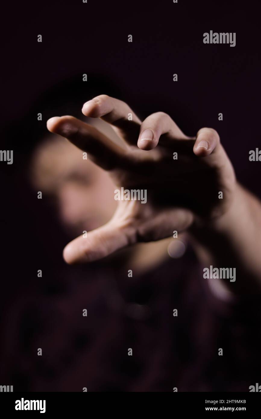 Vertical shot of a man's hand reaching forward Stock Photo - Alamy