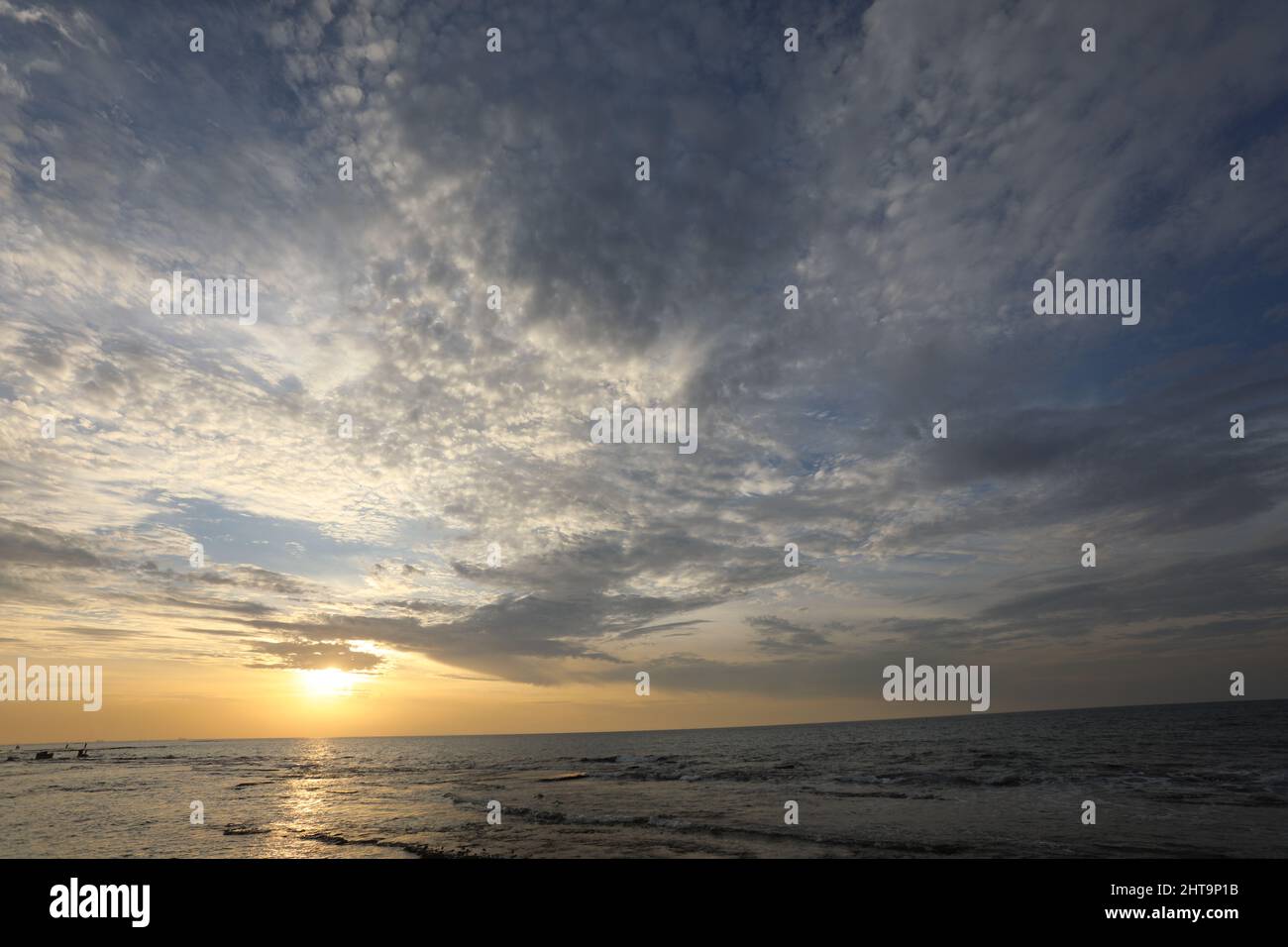 sunset in the evening over the sea High quality Stock Photo - Alamy