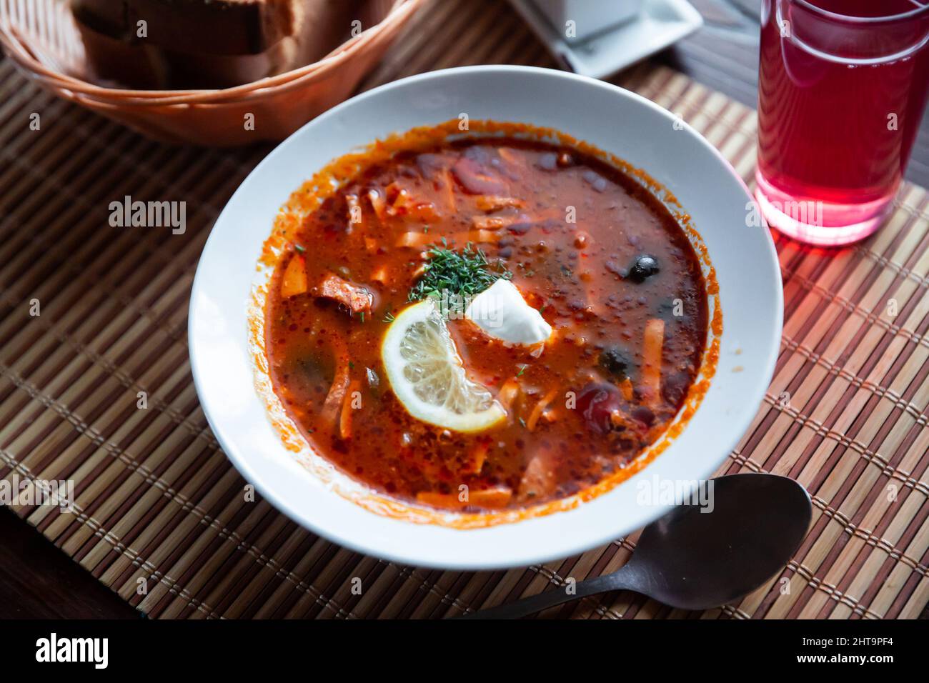 Russian cuisine - solyanka soup with ingredients Stock Photo - Alamy