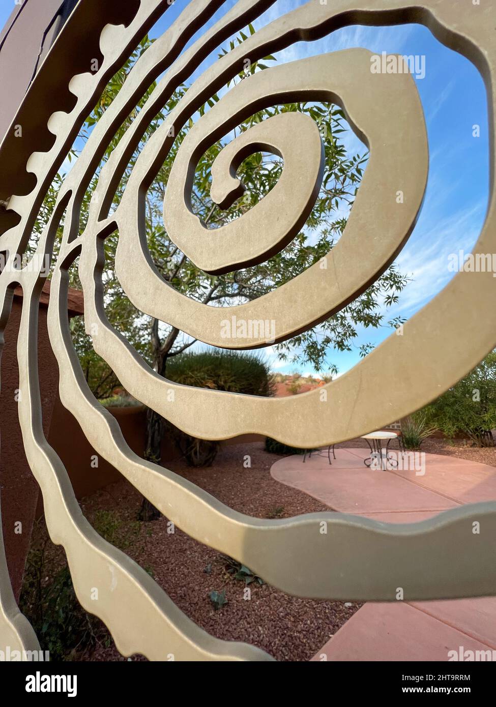 Closeup of a spiral gate design in a park Stock Photo - Alamy