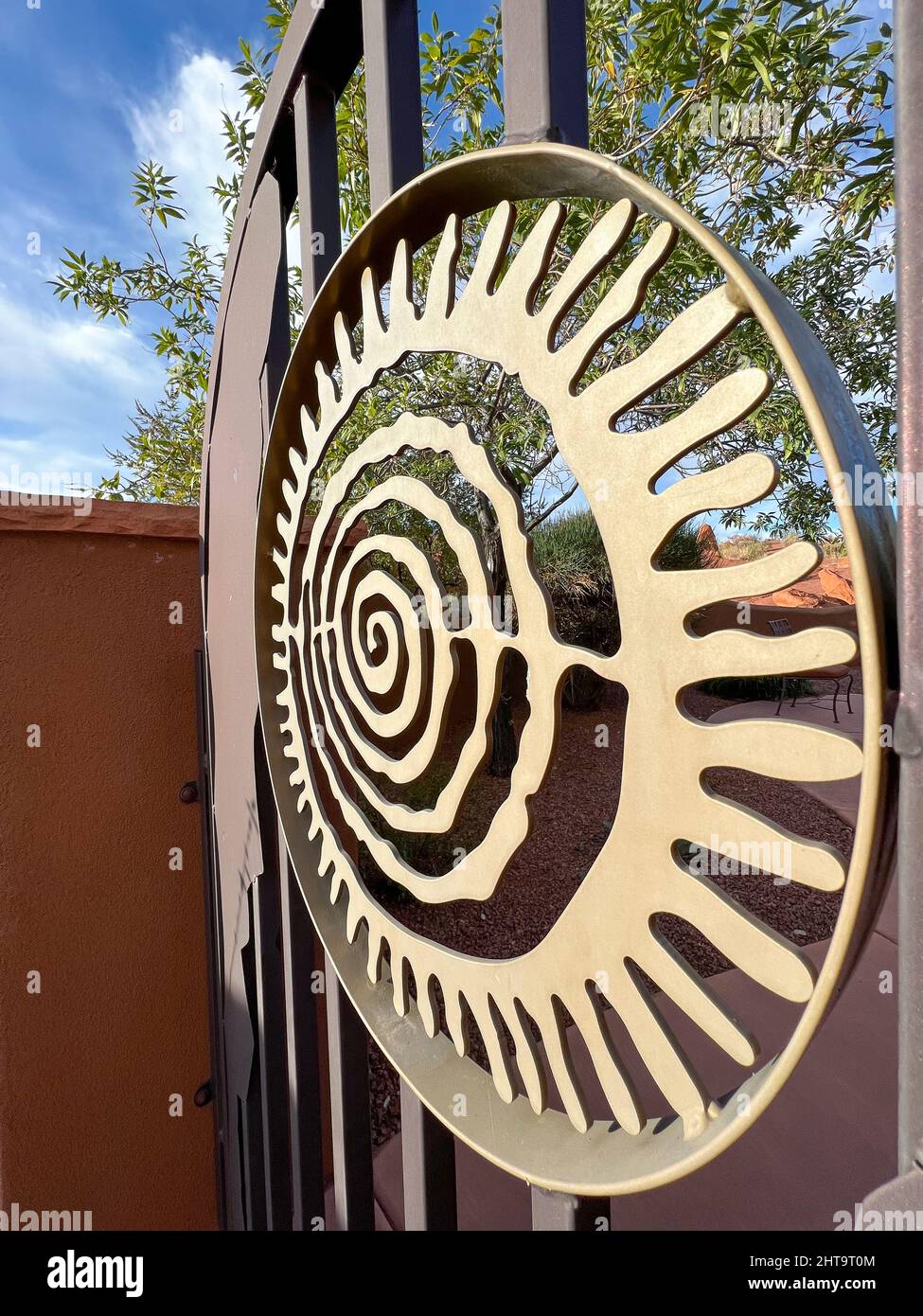 Closeup of a spiral gate design in a park Stock Photo - Alamy