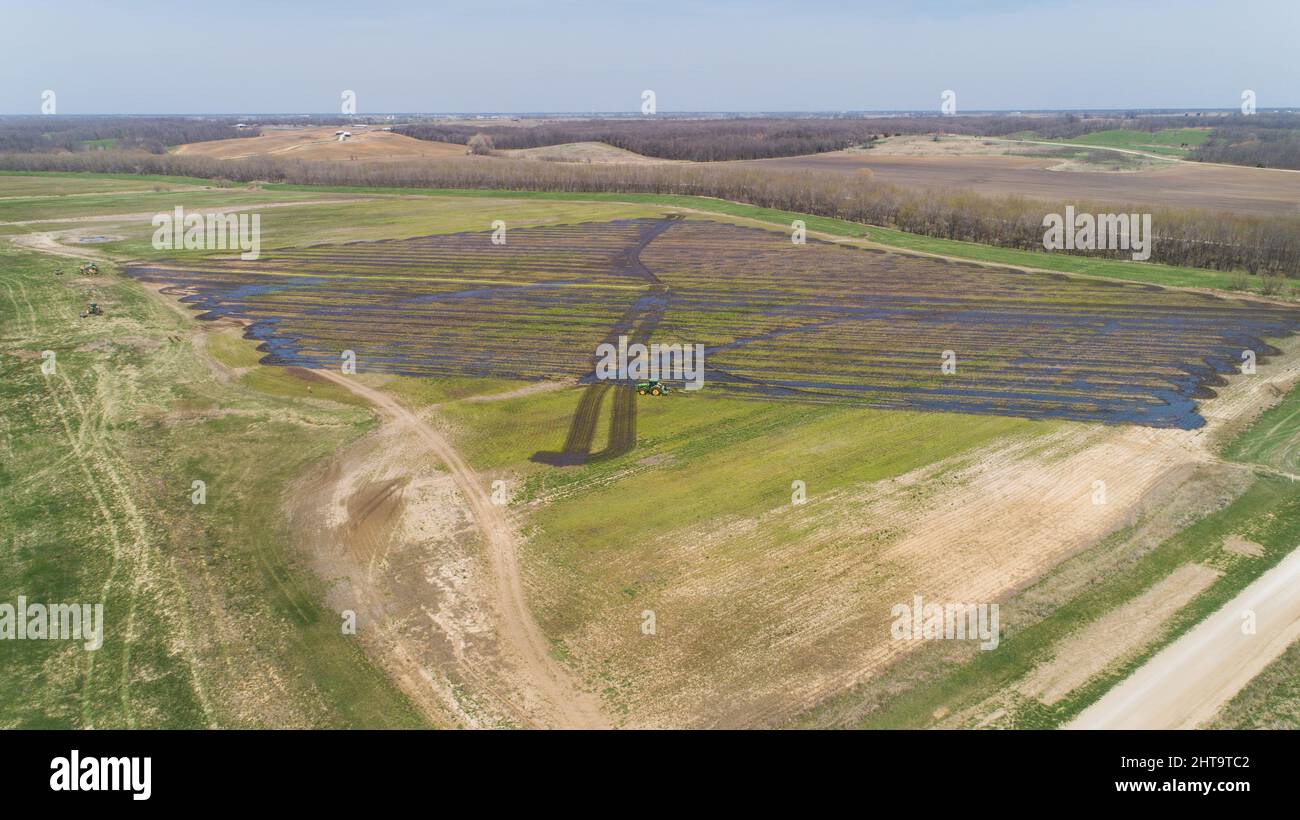 Beautiful view of pumping cow manure into fields Stock Photo - Alamy