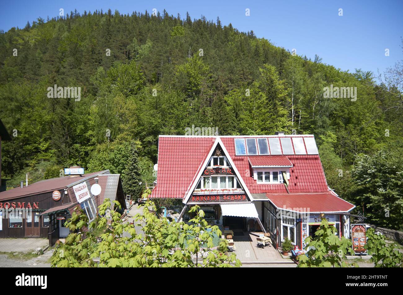 Closeup of a building with a hotel and restaurant in the town center ...