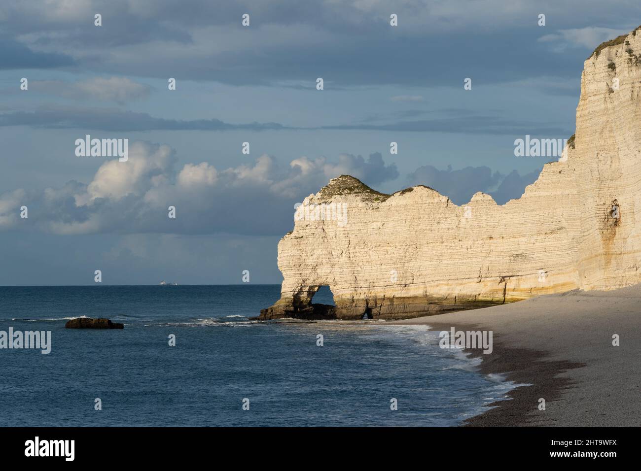 Closeup of The arch of the Manneporte cliff and the Valaine beach in ...