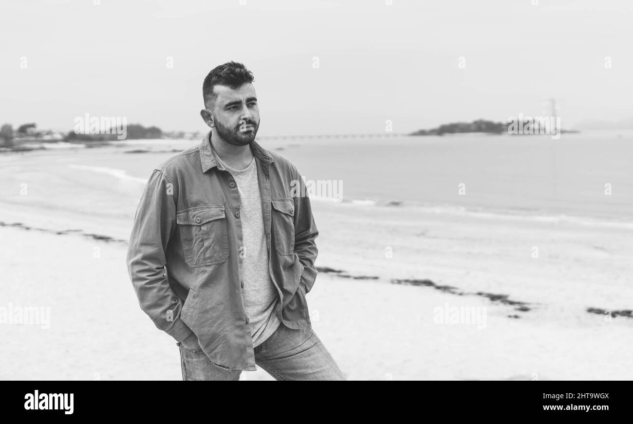 Male model at beach Black and White Stock Photos & Images - Alamy