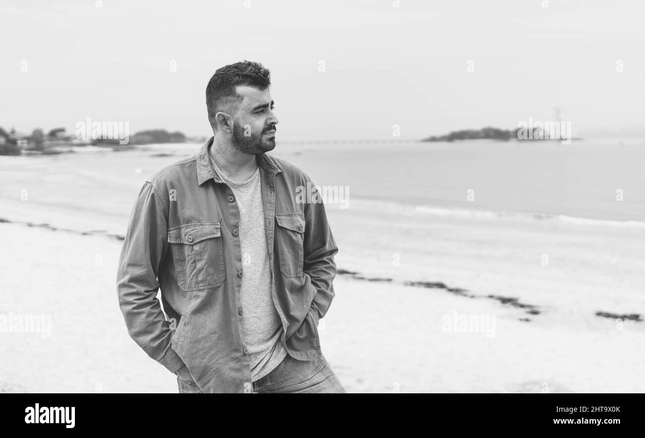 Fashion male model on beach Black and White Stock Photos & Images - Alamy