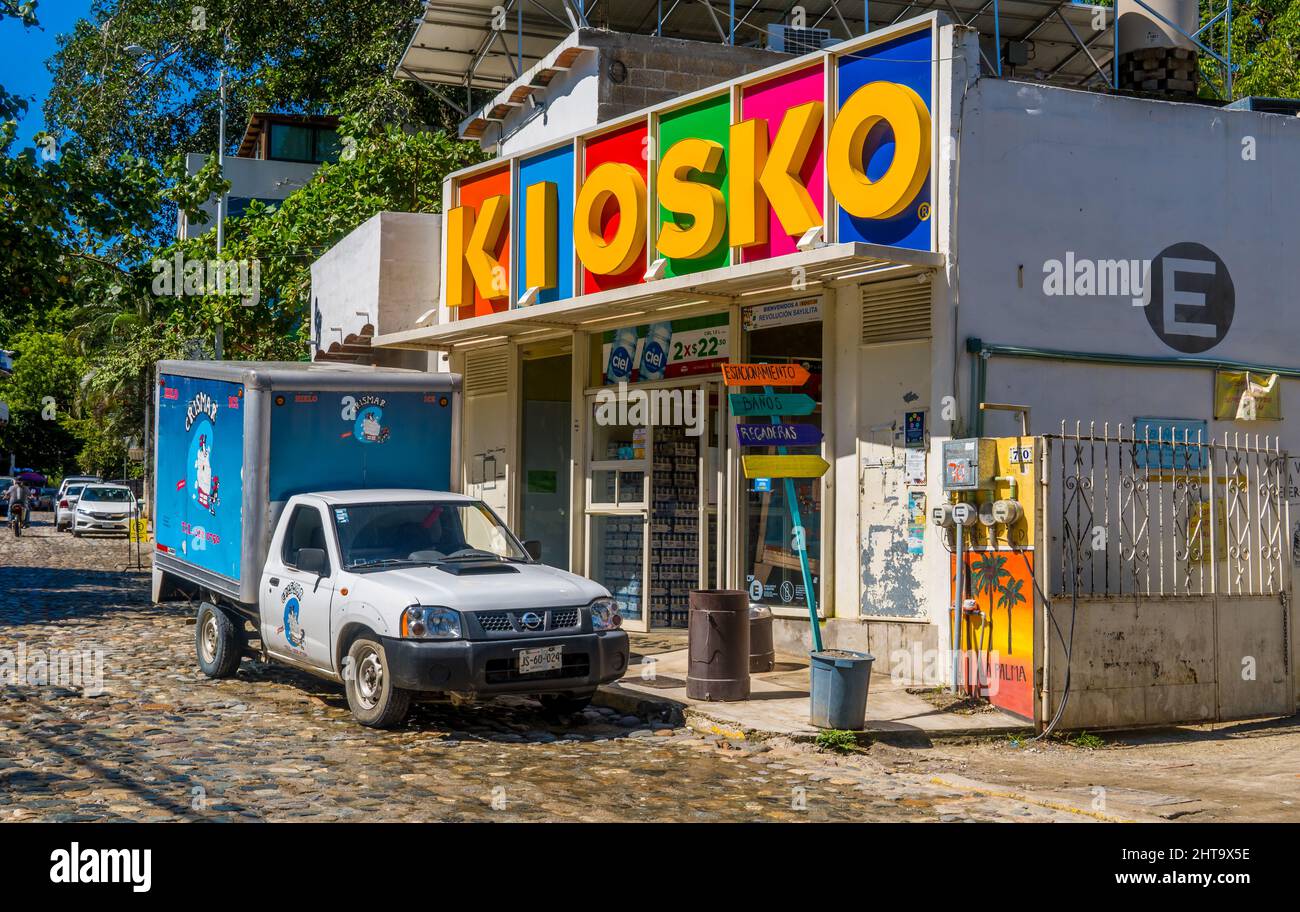 Truck in front of a kiosk convenience store in the magic town of ...