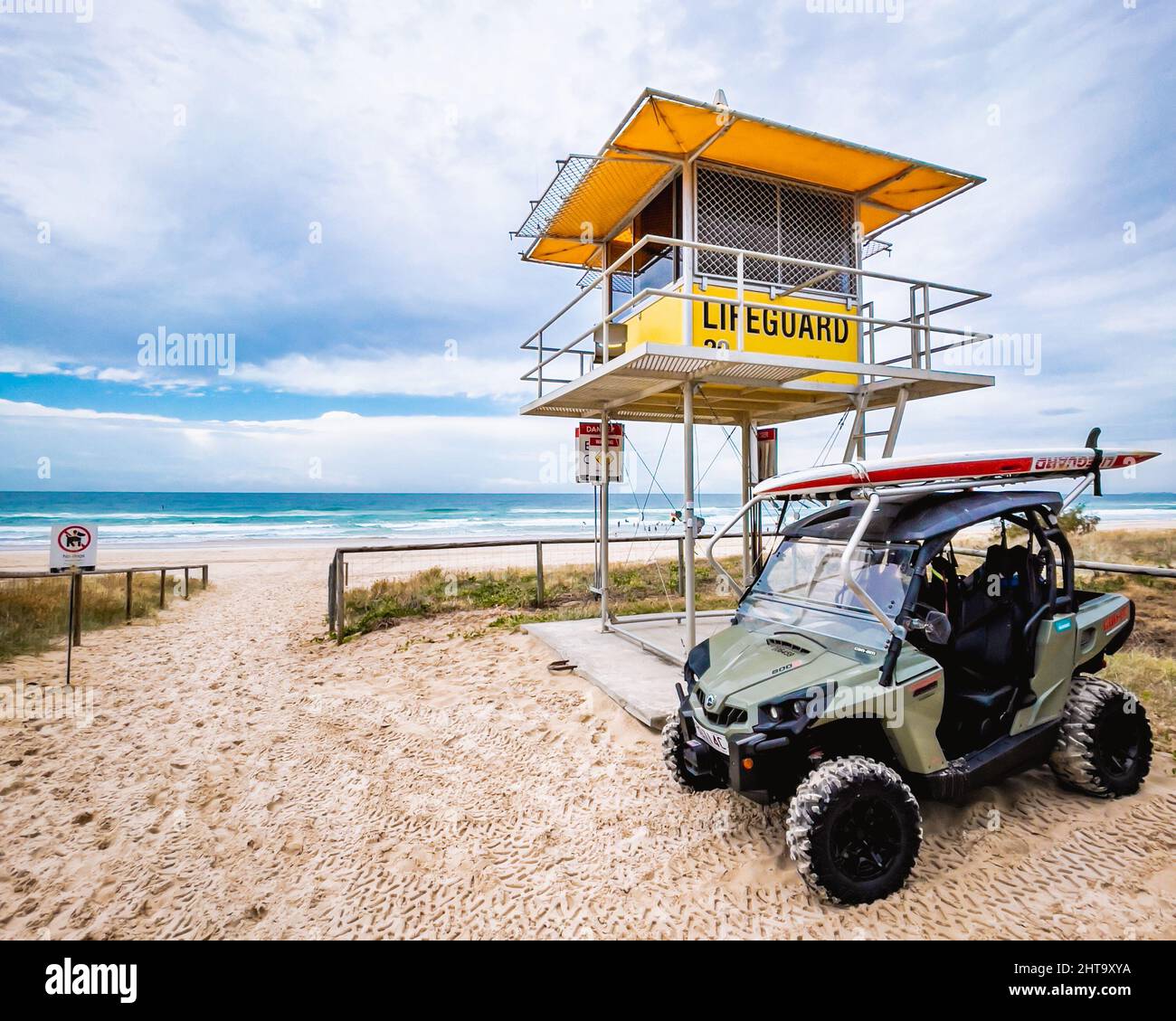Lifeguard tower and a quad bike on the beach in Gold Coast, Queensland ...