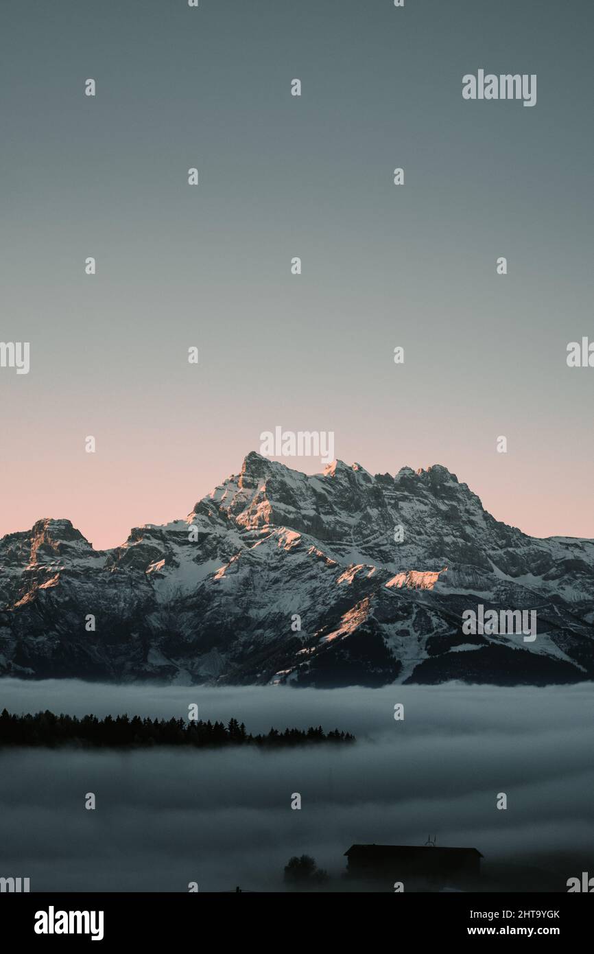 Vertical shot of the beautiful mountains in Leysin, Switzerland Stock ...