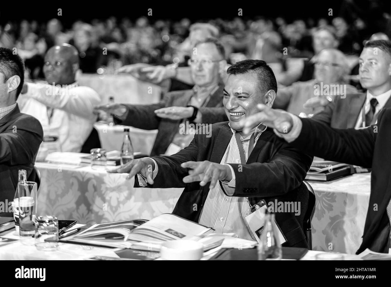 Delegates attending sales convention at large conference centre Stock ...