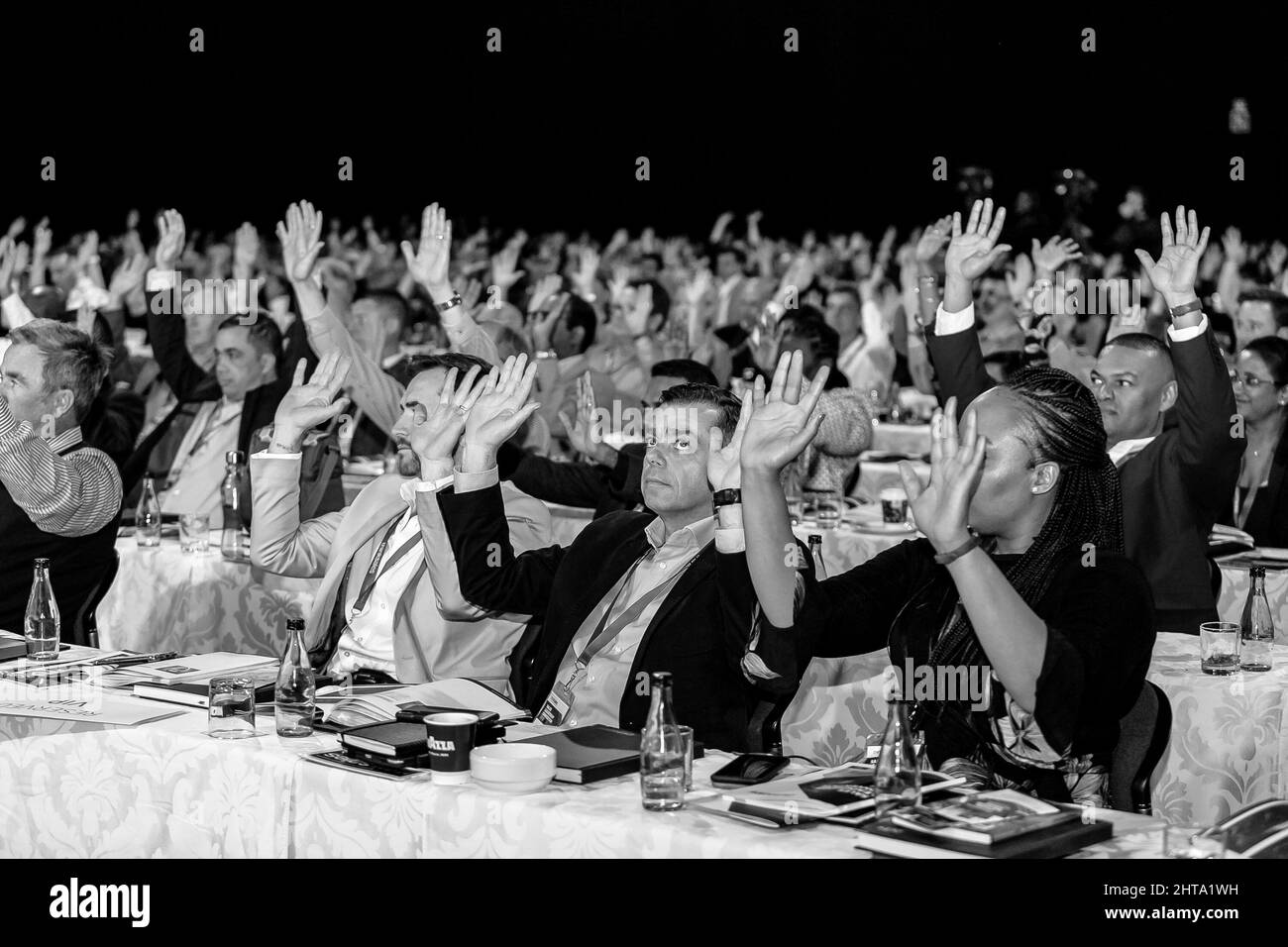 Delegates attending sales convention at the large conference center in ...