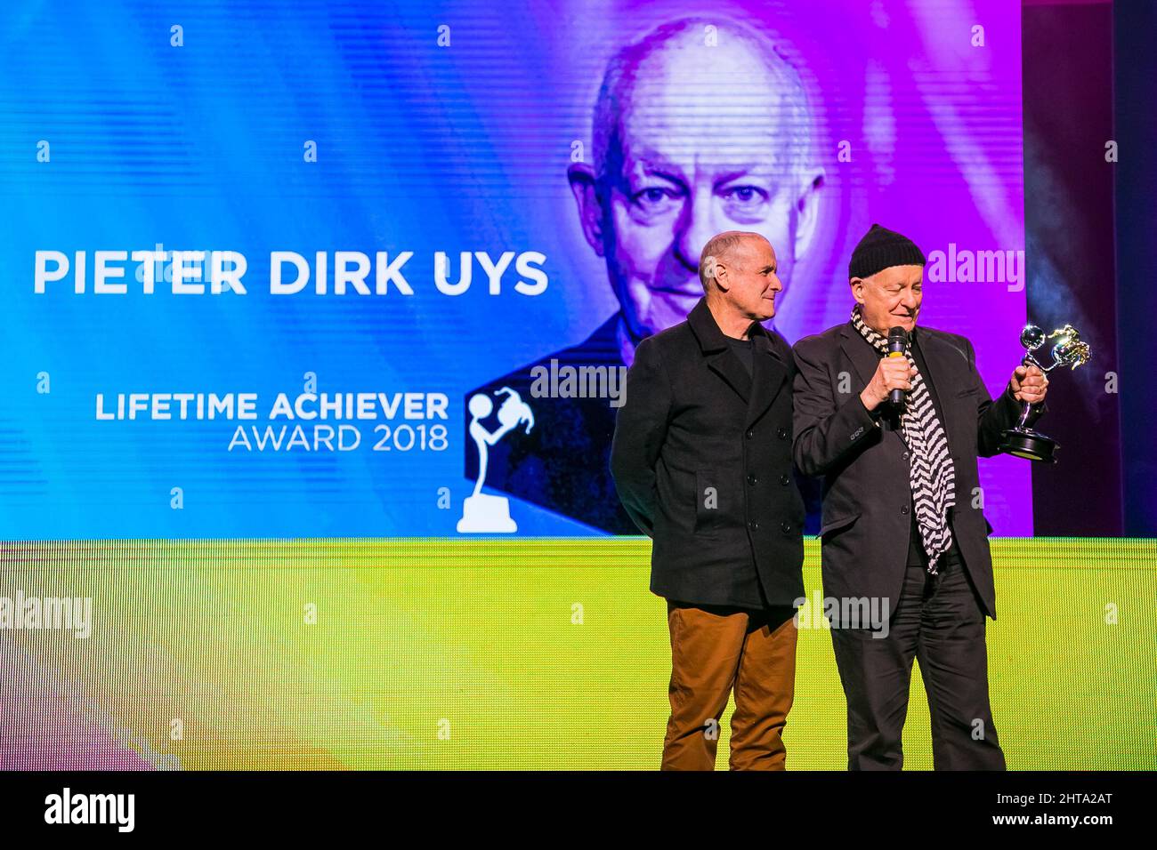 Pieter Dirk Uys receiving a lifetime achievement award from musical ...