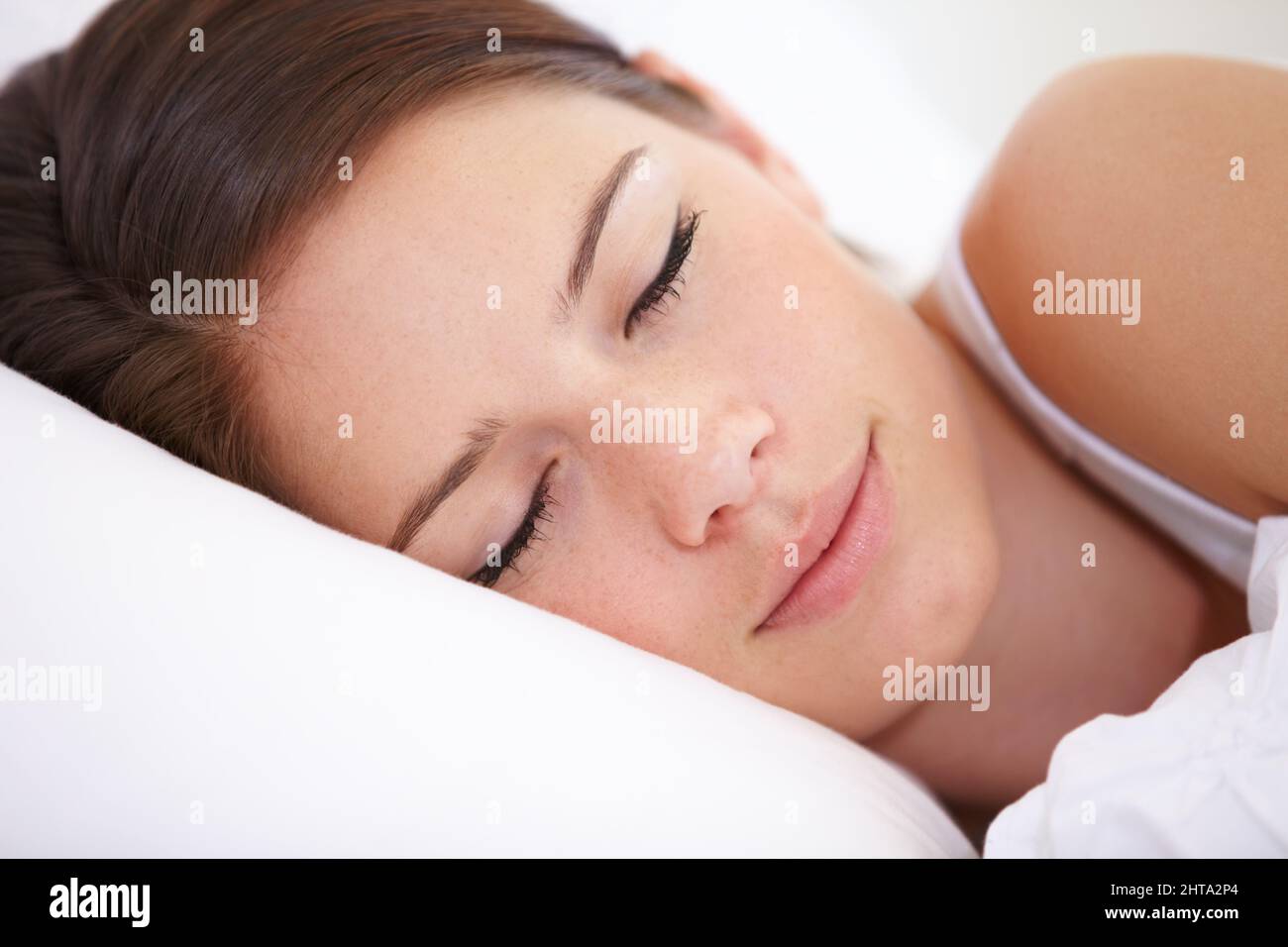 Beauty sleep. A young woman fast asleep Stock Photo - Alamy