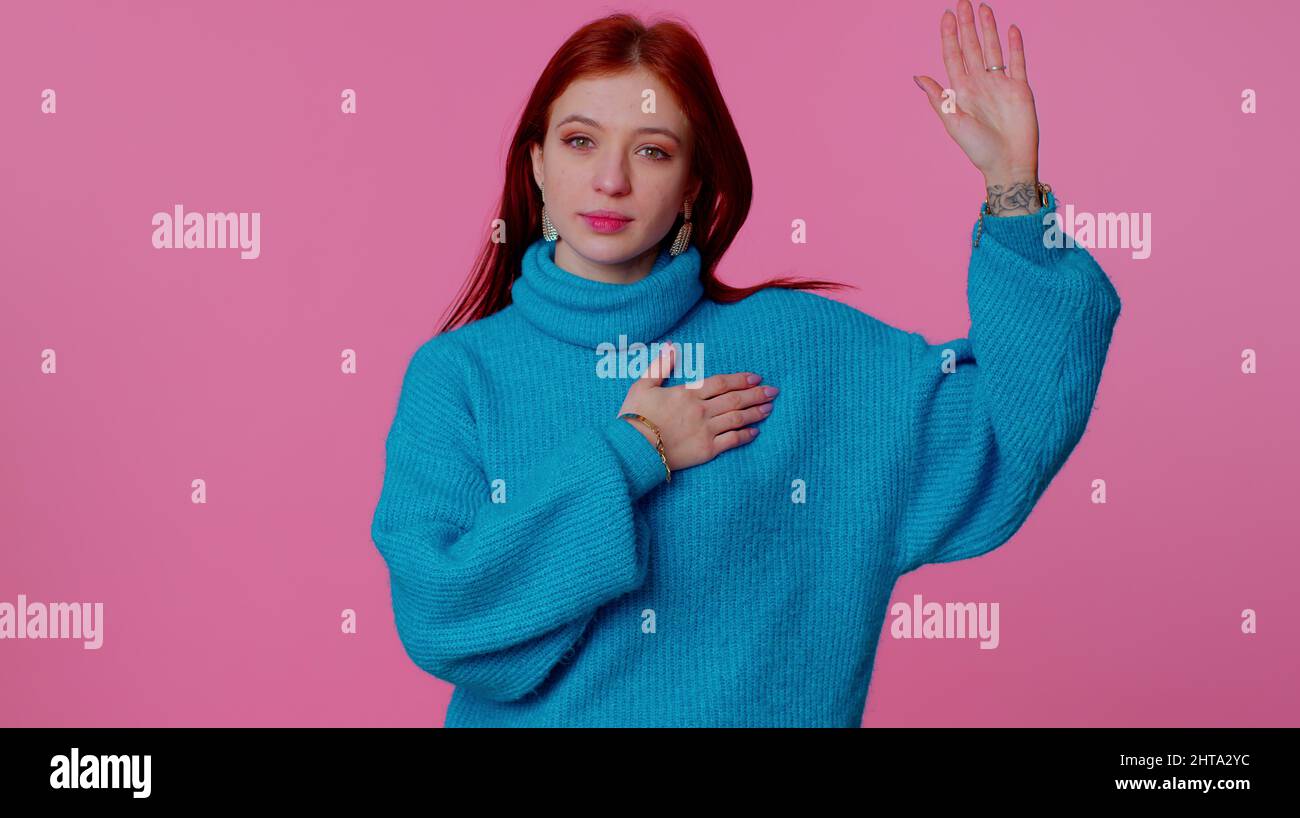 I swear to be honest. Sincere responsible teen student girl raising ...