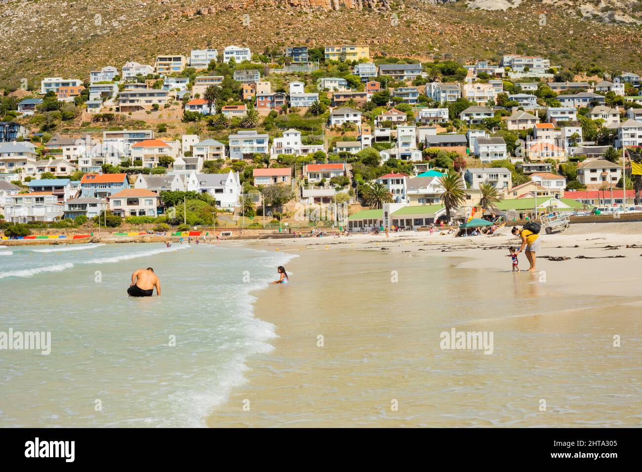 Beachgoers in the small coastal town of Fish Hoek Stock Photo - Alamy
